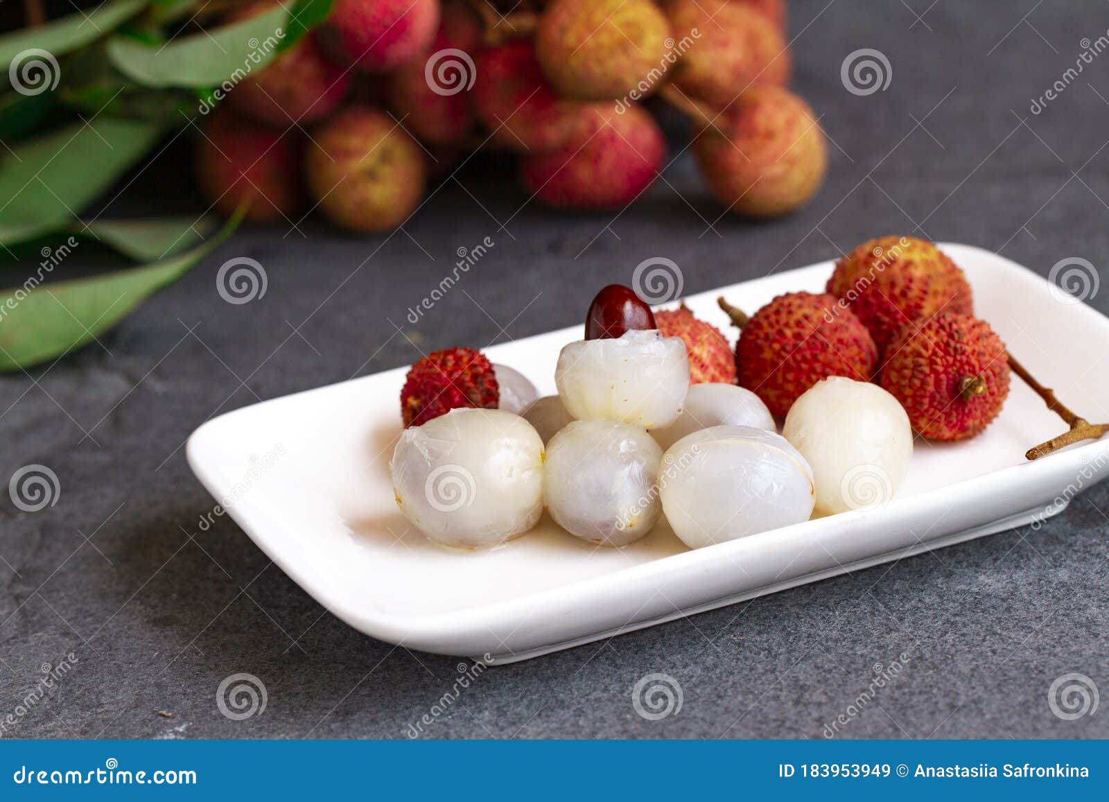 Lychee with Leaves on Gray Background. Tropical Fruit Stock Image ...