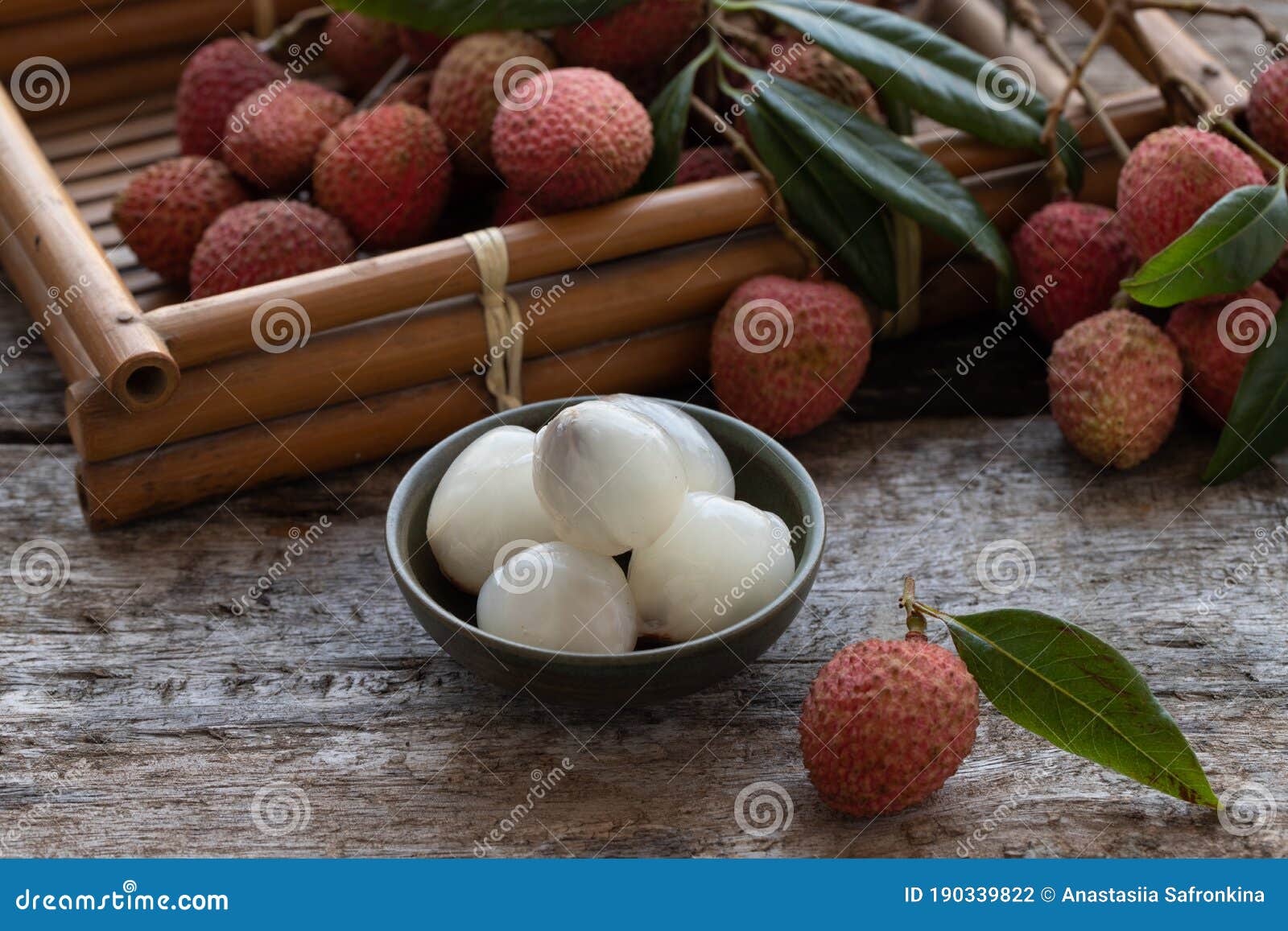 Lychee with Leaves on Gray Background. Tropical Fruit. Stock Photo ...