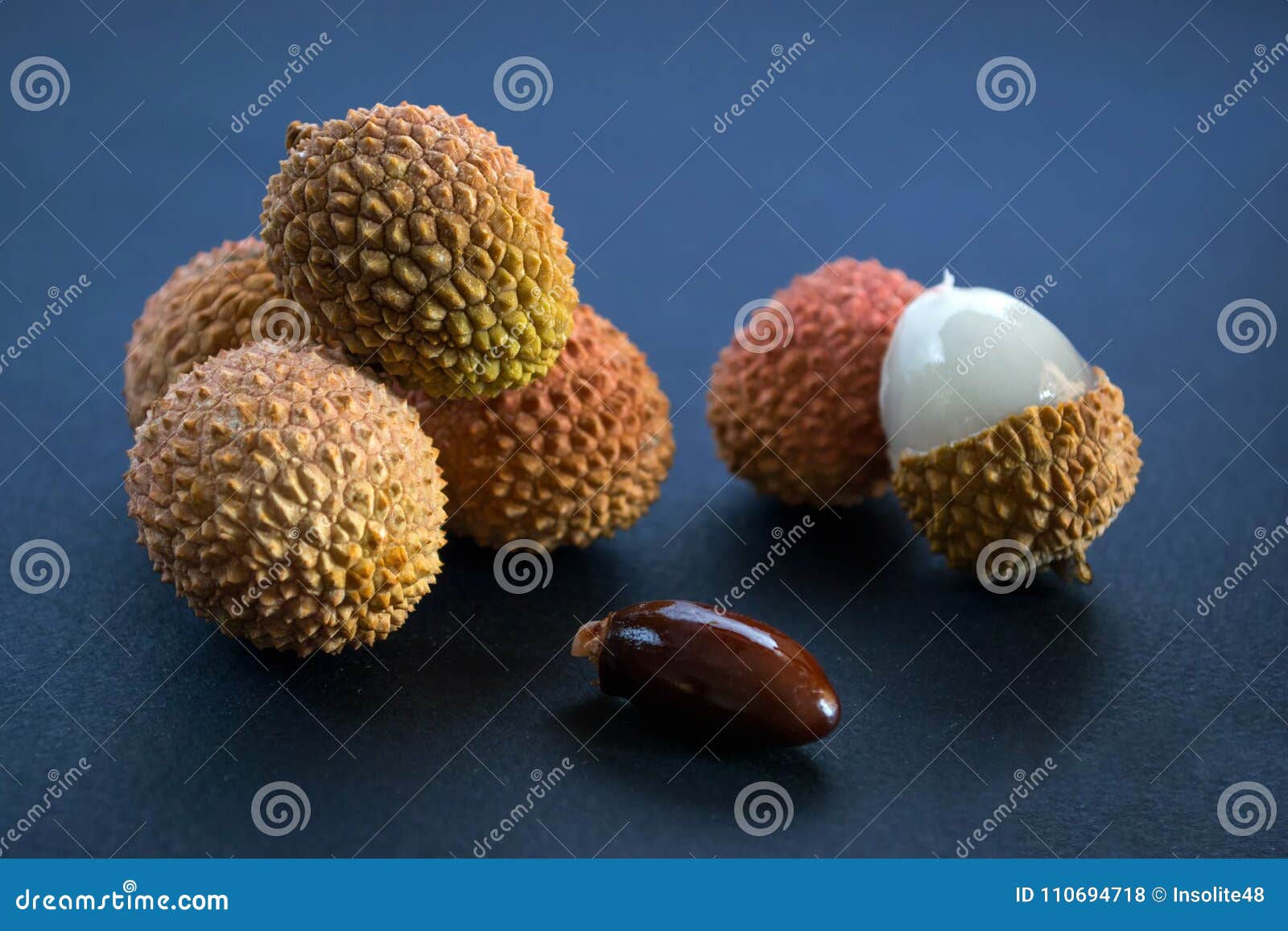 Lychee Litchi with a Stone and Bright, Bumpy Skin on Blue Background ...