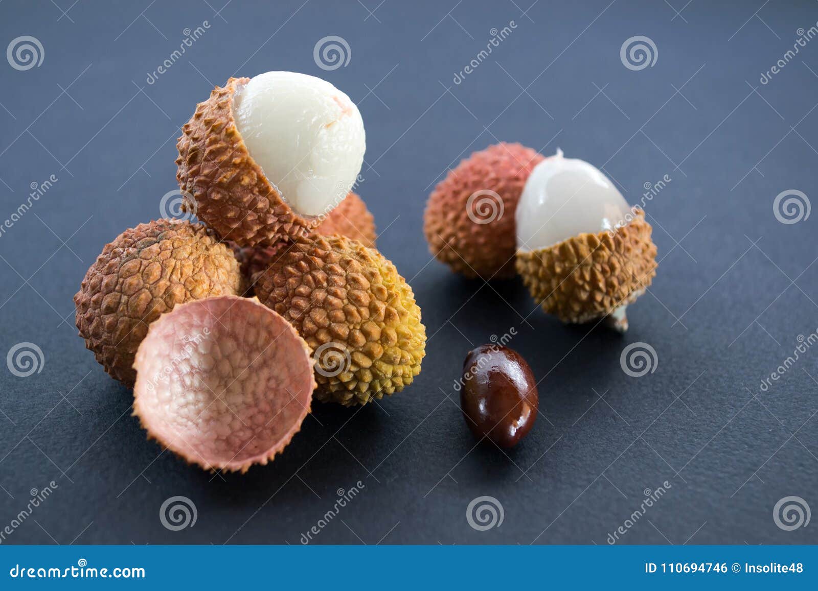 Lychee Litchi with a Stone and Bright, Bumpy Skin on Dark Blue Black ...