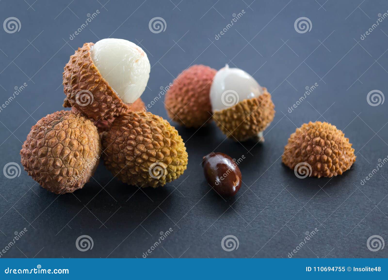 Lychee Litchi with a Stone and Bright, Bumpy Skin on Dark Blue Black ...