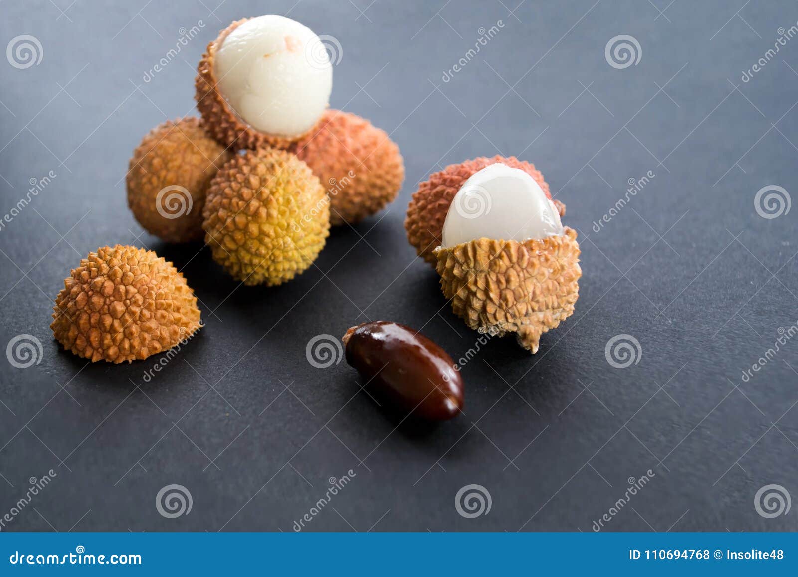 Lychee Litchi with a Stone and Bright, Bumpy Skin on Dark Blue Black ...