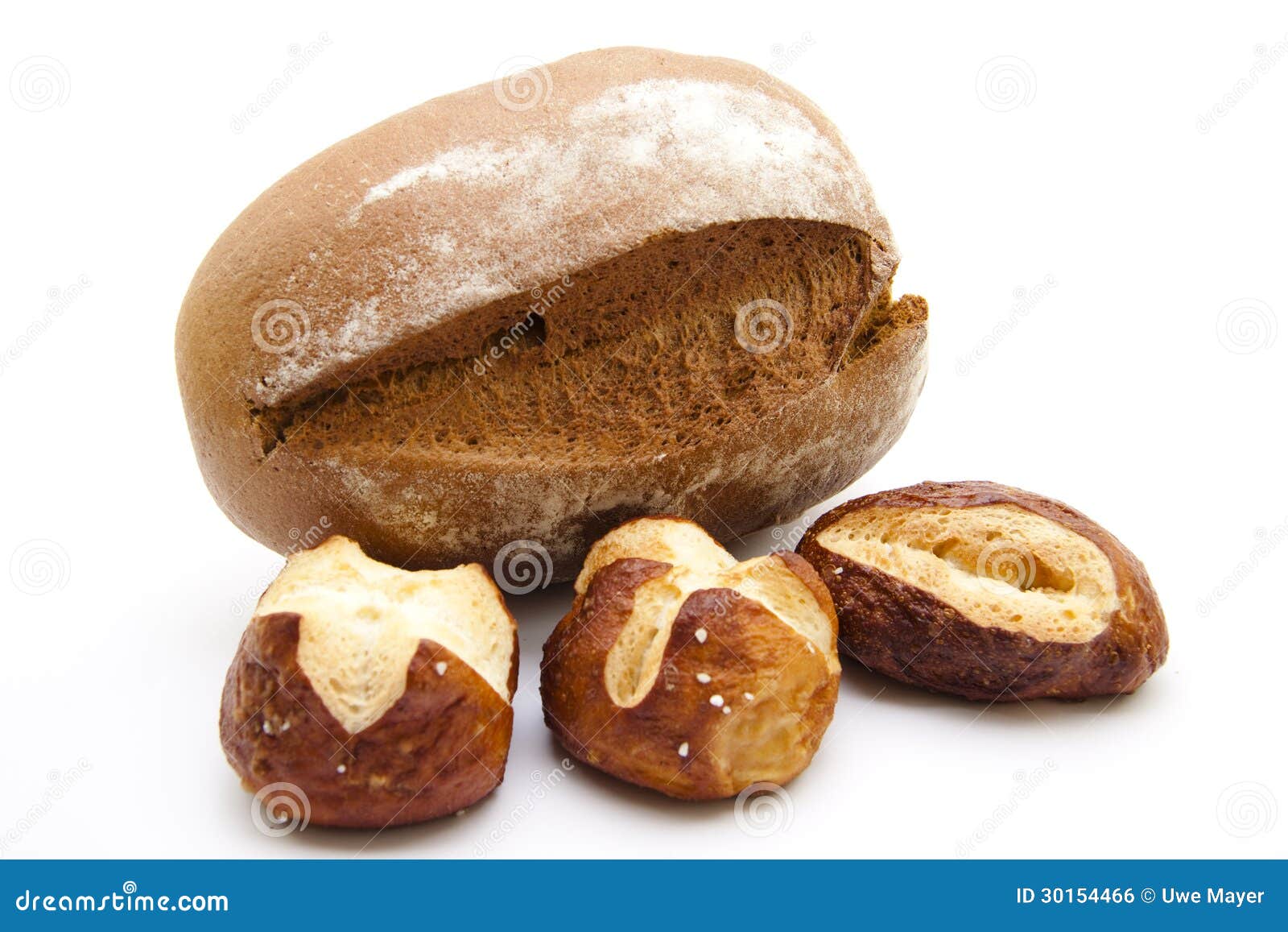 Lye Bread Rolls and Wheat Bread Stock Photo - Image of salt, brown ...