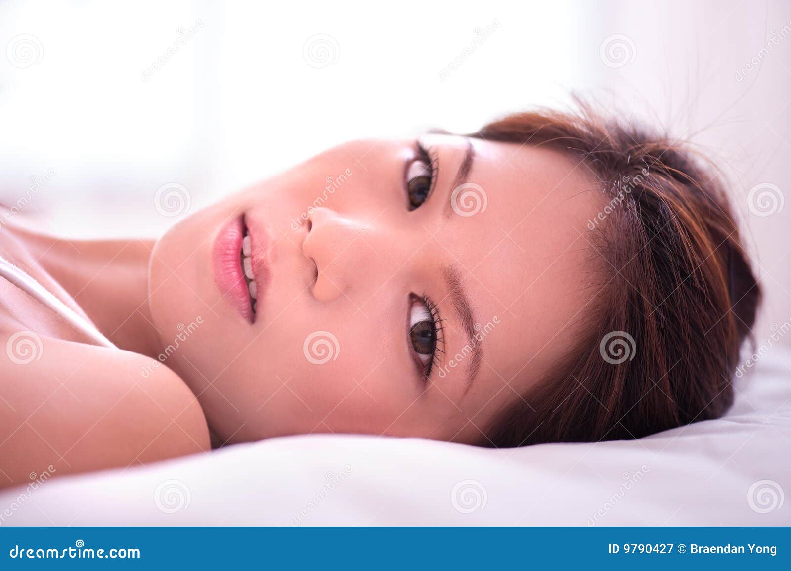 Lying on the bed 3 stock image. Image of eyes, sheets - 9790427