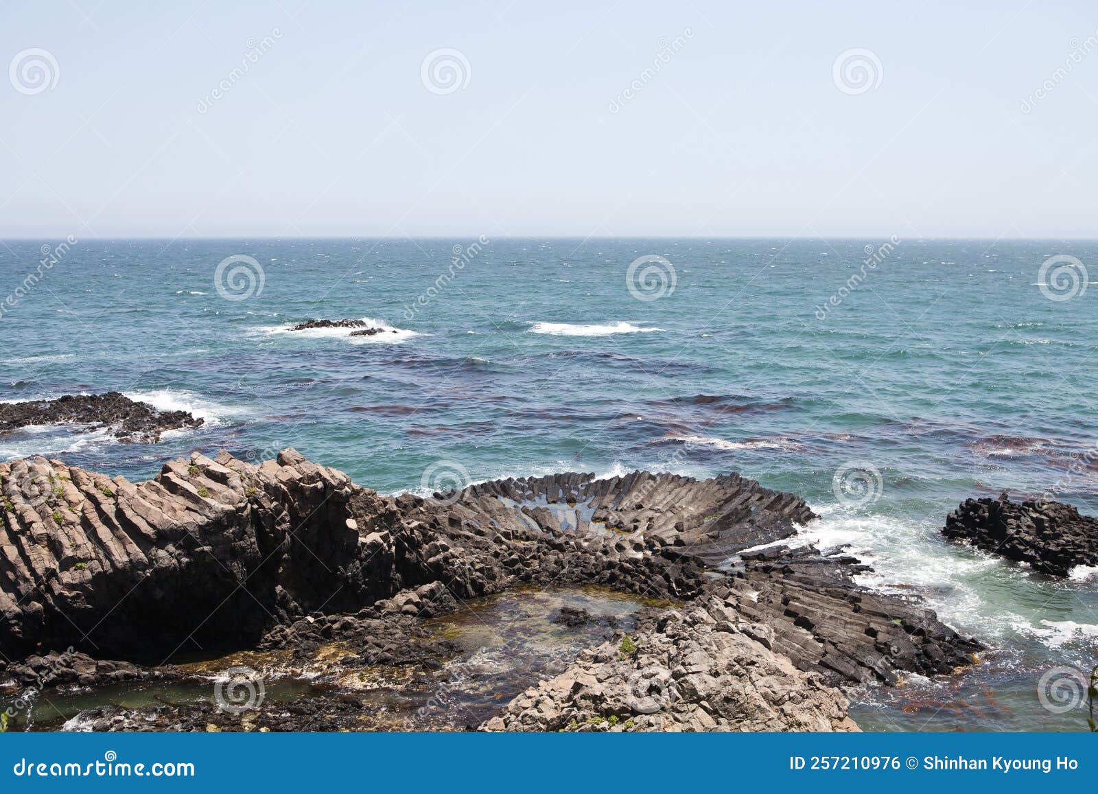 Lying Columnar Joints And Waves Are In Harmony With The Landscape Stock ...