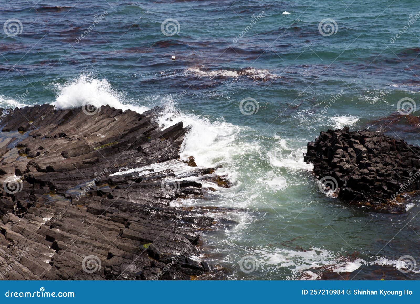Lying Columnar Joints And Waves Are In Harmony With The Landscape Stock ...