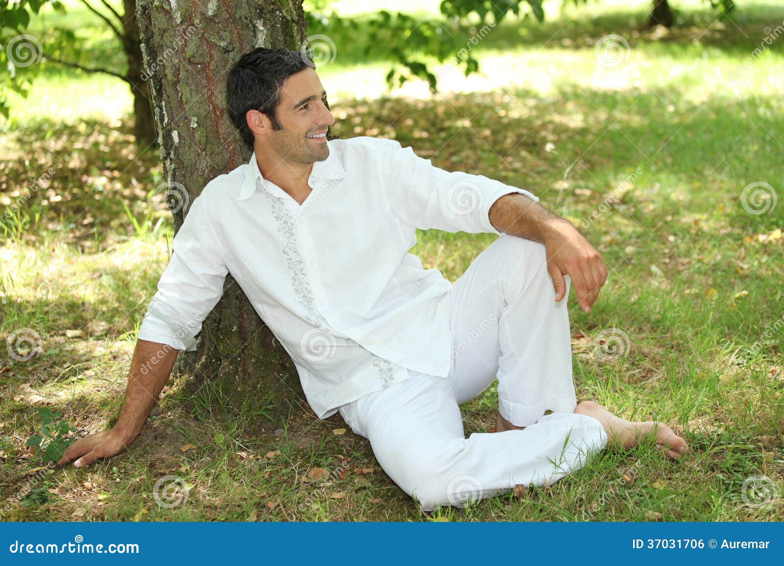 Lying down under a tree stock photo. Image of holidays - 37031706