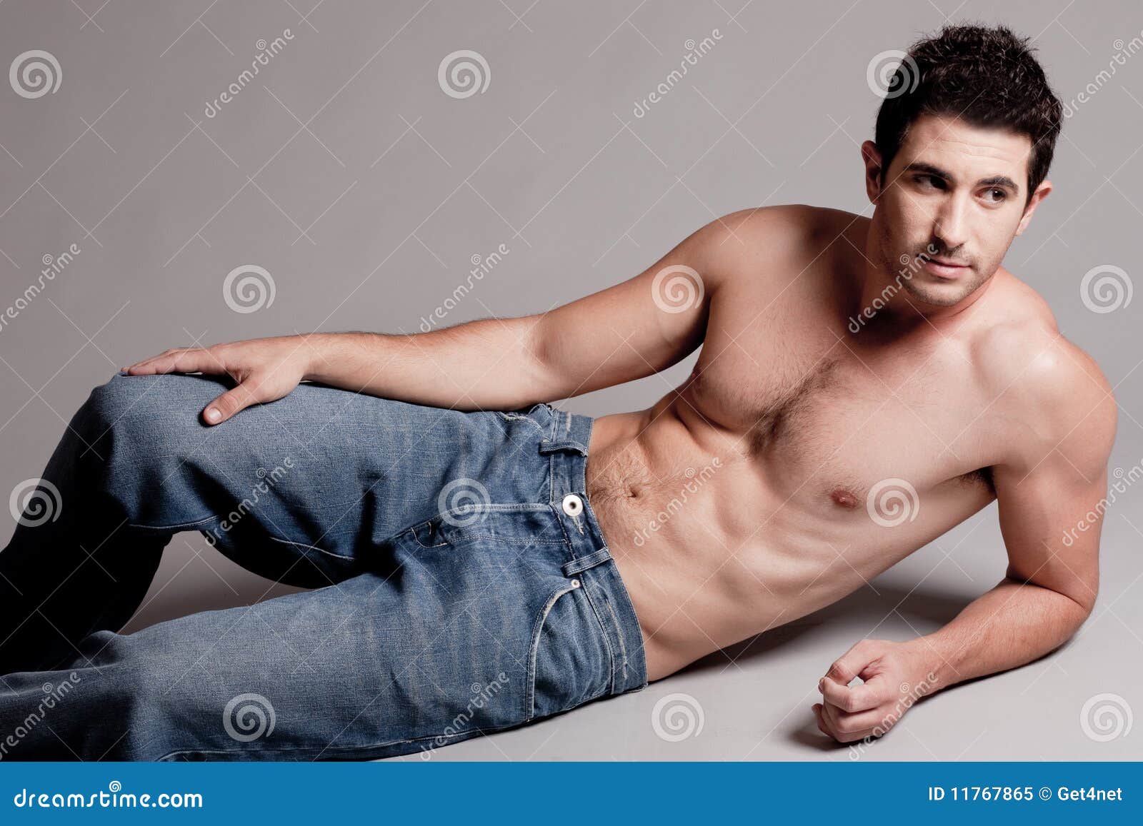 Lying Muscular Man Looking at the Left Corner Stock Image - Image of ...