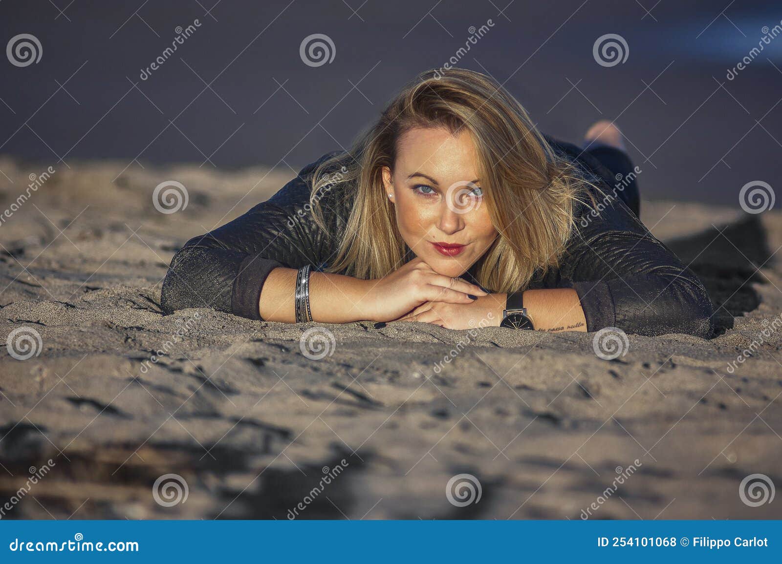 Lying on the sand #2 stock photo. Image of fashion, person - 254101068