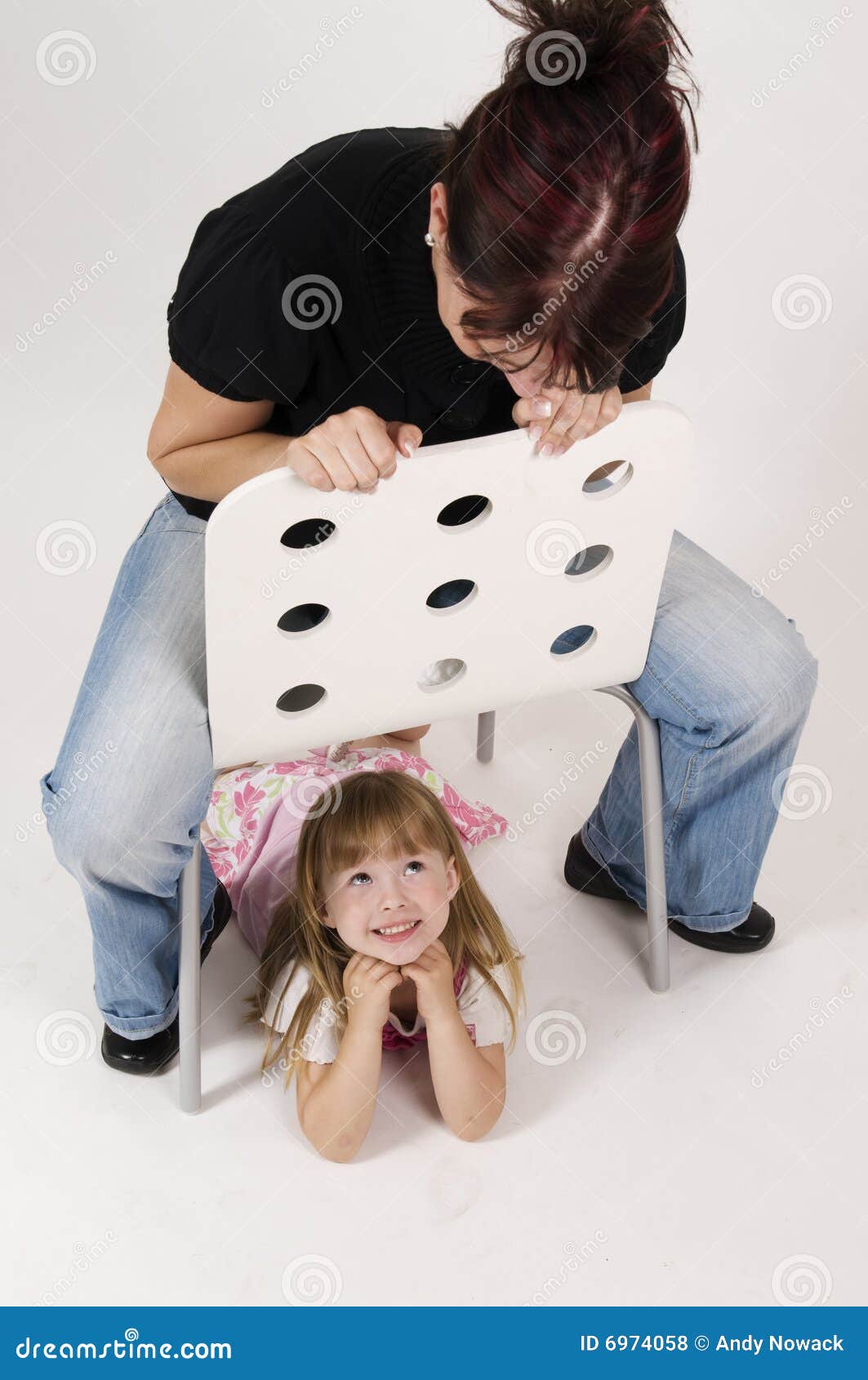 Lying under chair stock photo. Image of studio, person - 6974058