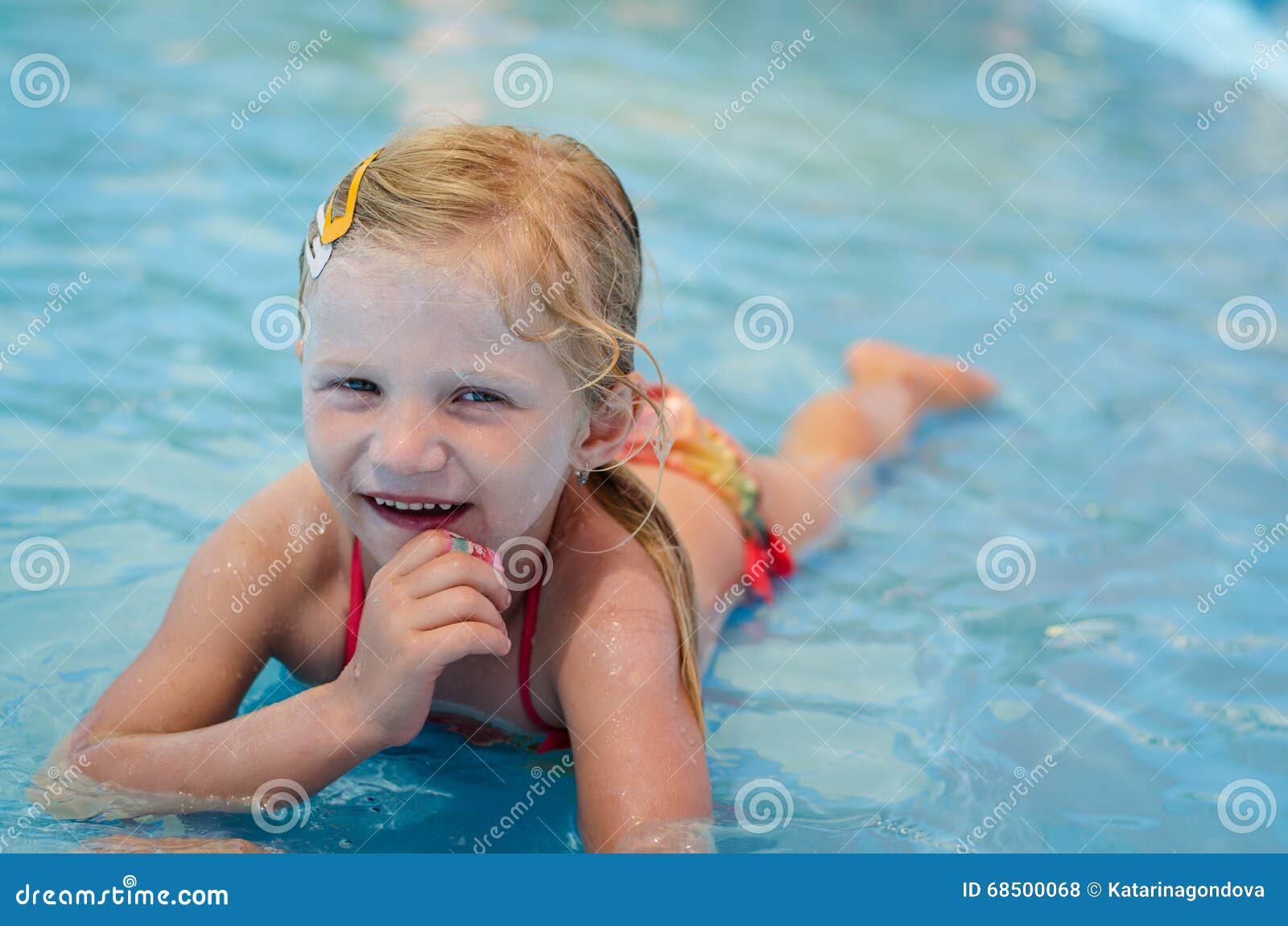 Lying in the water stock photo. Image of blue, happy - 68500068