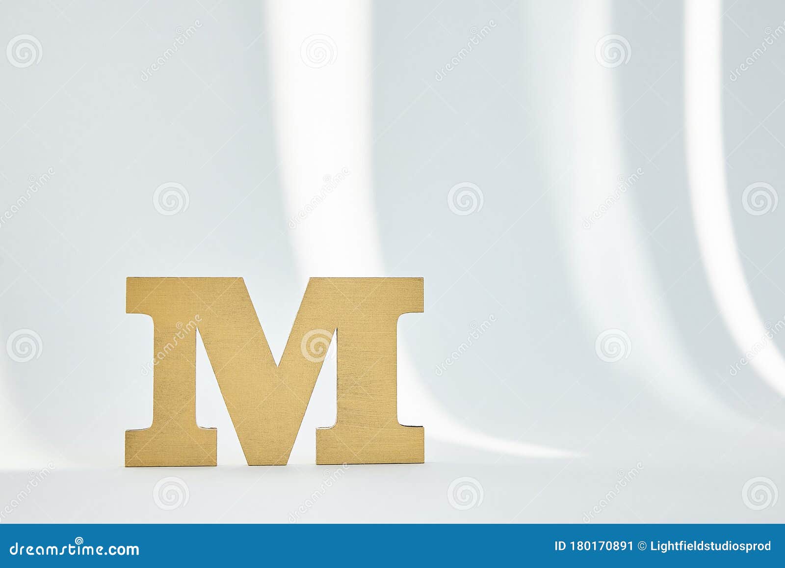 M Letter on White Background Stock Image - Image of daytime, sunny ...