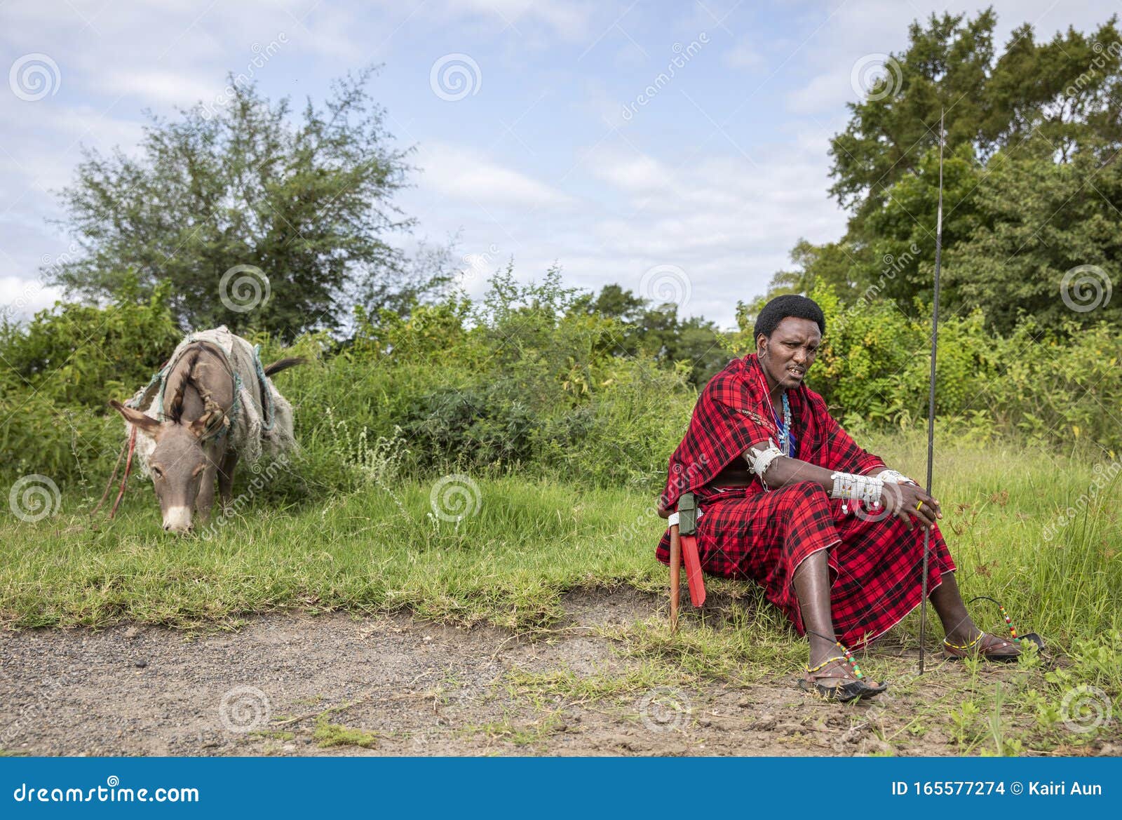 Maasai warrior resting stock photo. Image of dirty, mkomazi - 165577274
