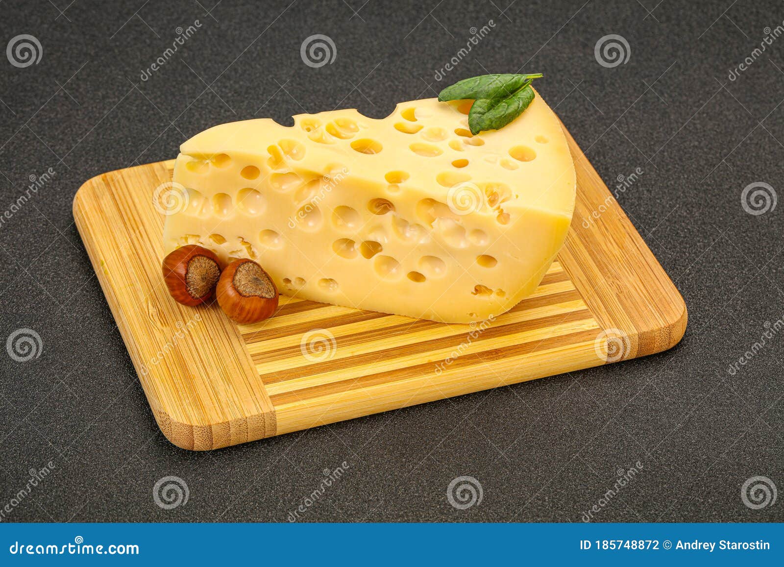 Maasdam Cheese - Yellow Triangle with Holes Stock Photo - Image of ...