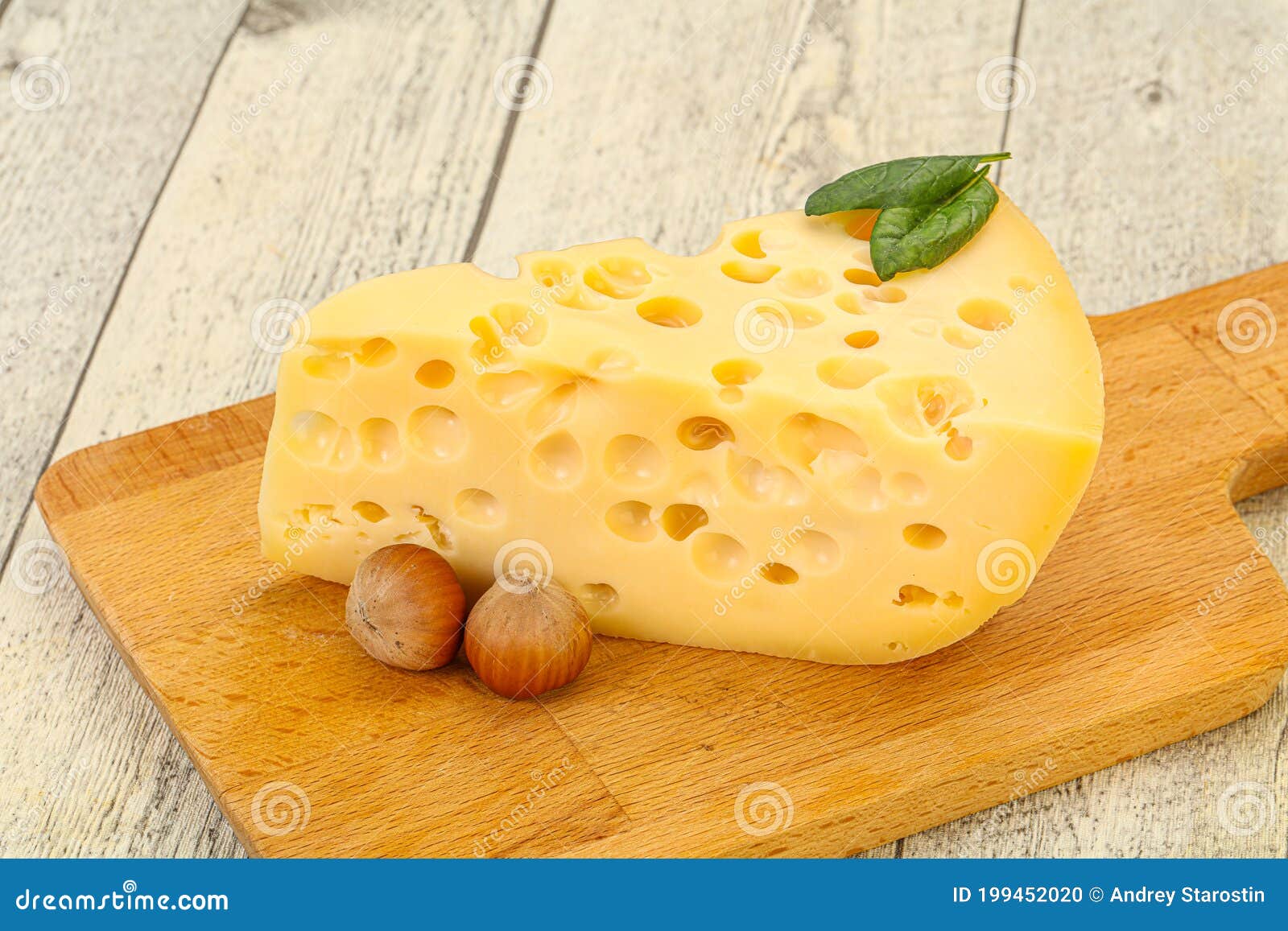 Maasdam Cheese - Yellow Triangle with Holes Stock Photo - Image of ...