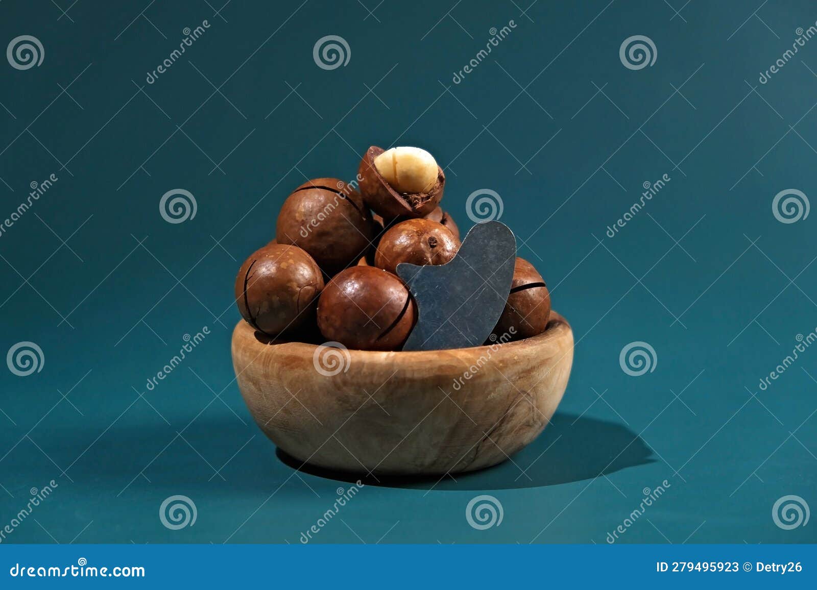 Macadamia Nuts with a Key on Turquoise Background Stock Image - Image ...