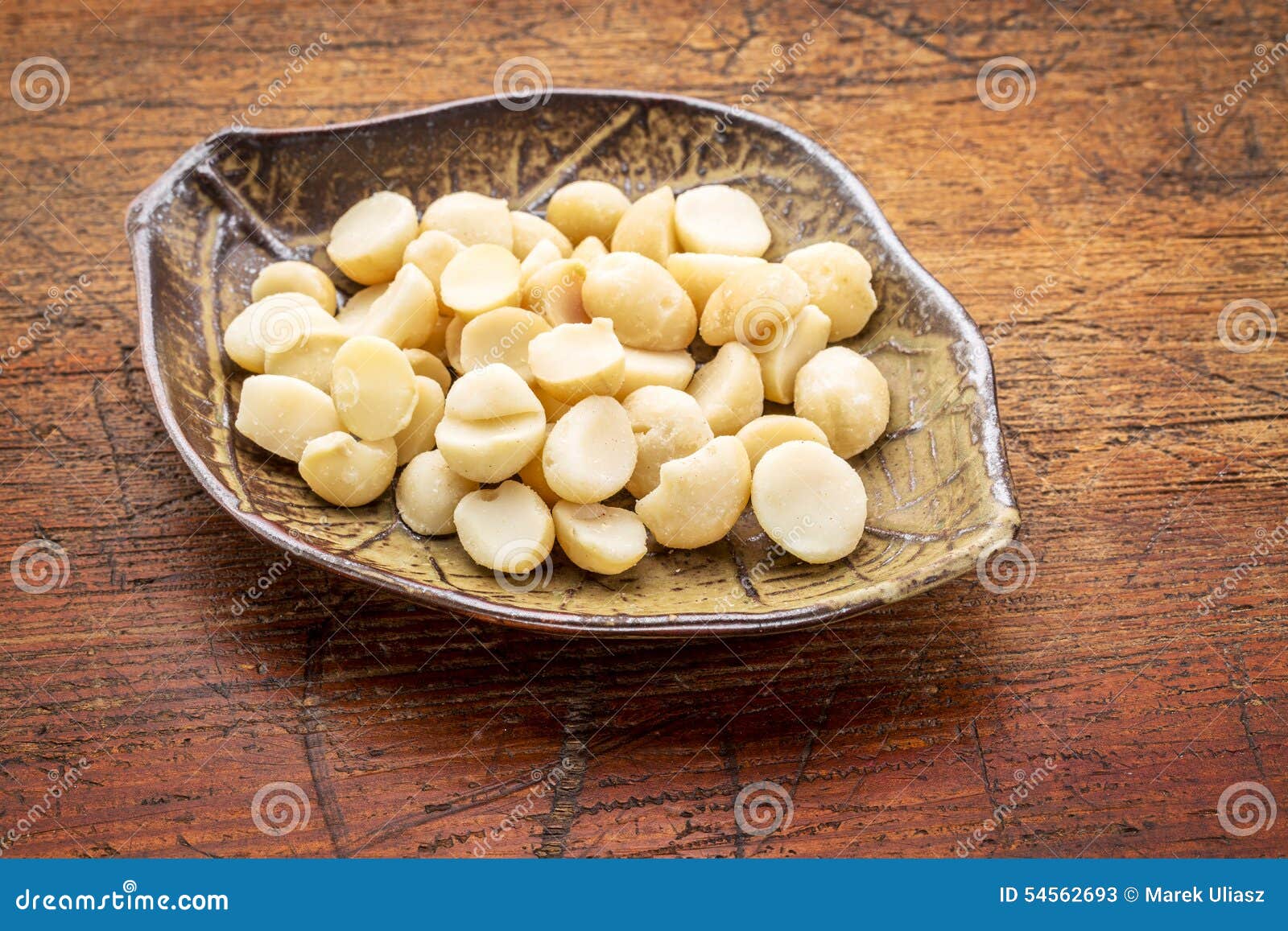 Macadamia Nuts on Leaf Bowl Stock Image - Image of wood, weathered ...