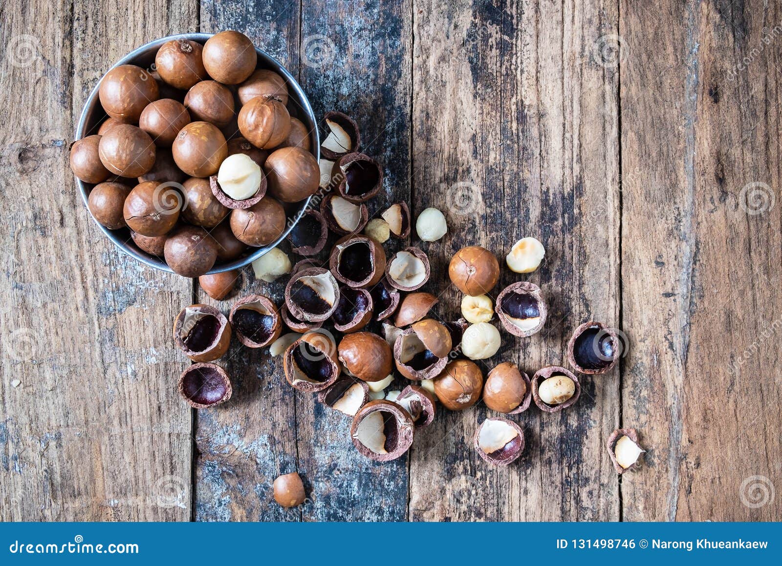 Macadamia Nuts with Shells in a Bowl Stock Photo - Image of background ...