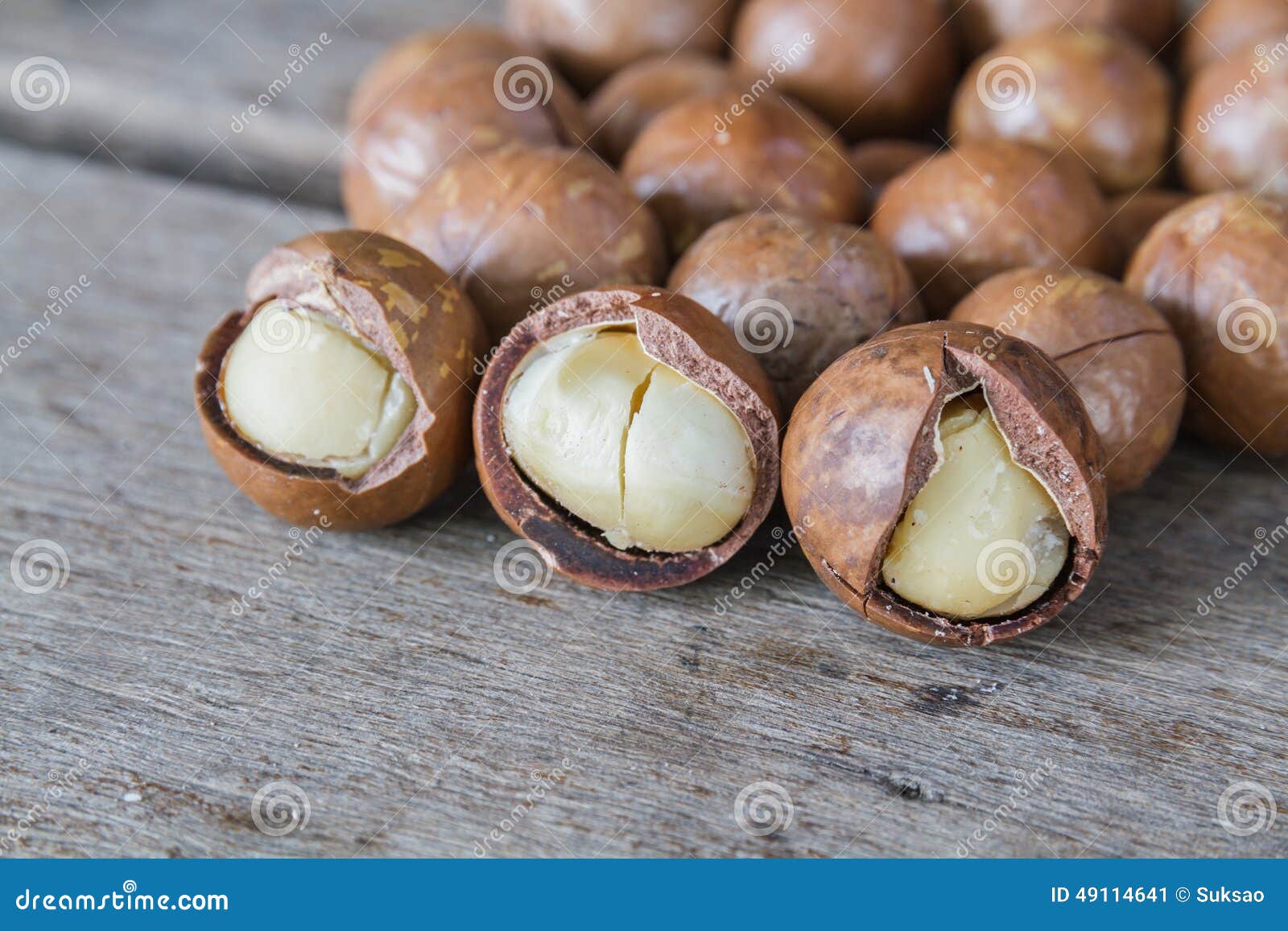 Macadamia on wood table. stock image. Image of plant - 49114641
