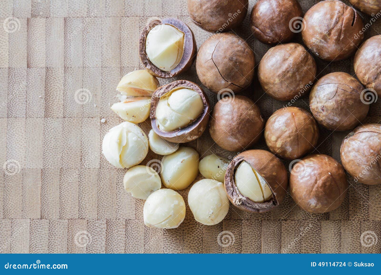 Macadamia on wood table. stock photo. Image of white - 49114724