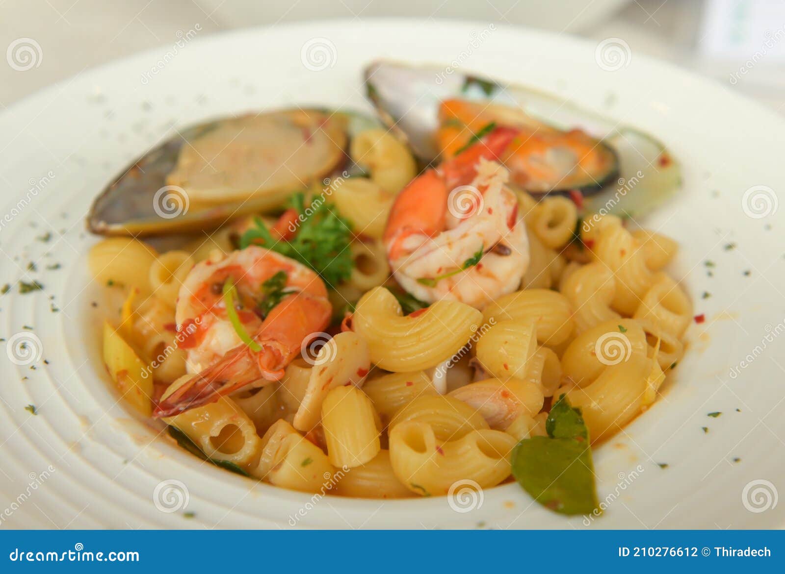 Macaroni with Shrimp and Seafood on the Background Stock Photo - Image ...