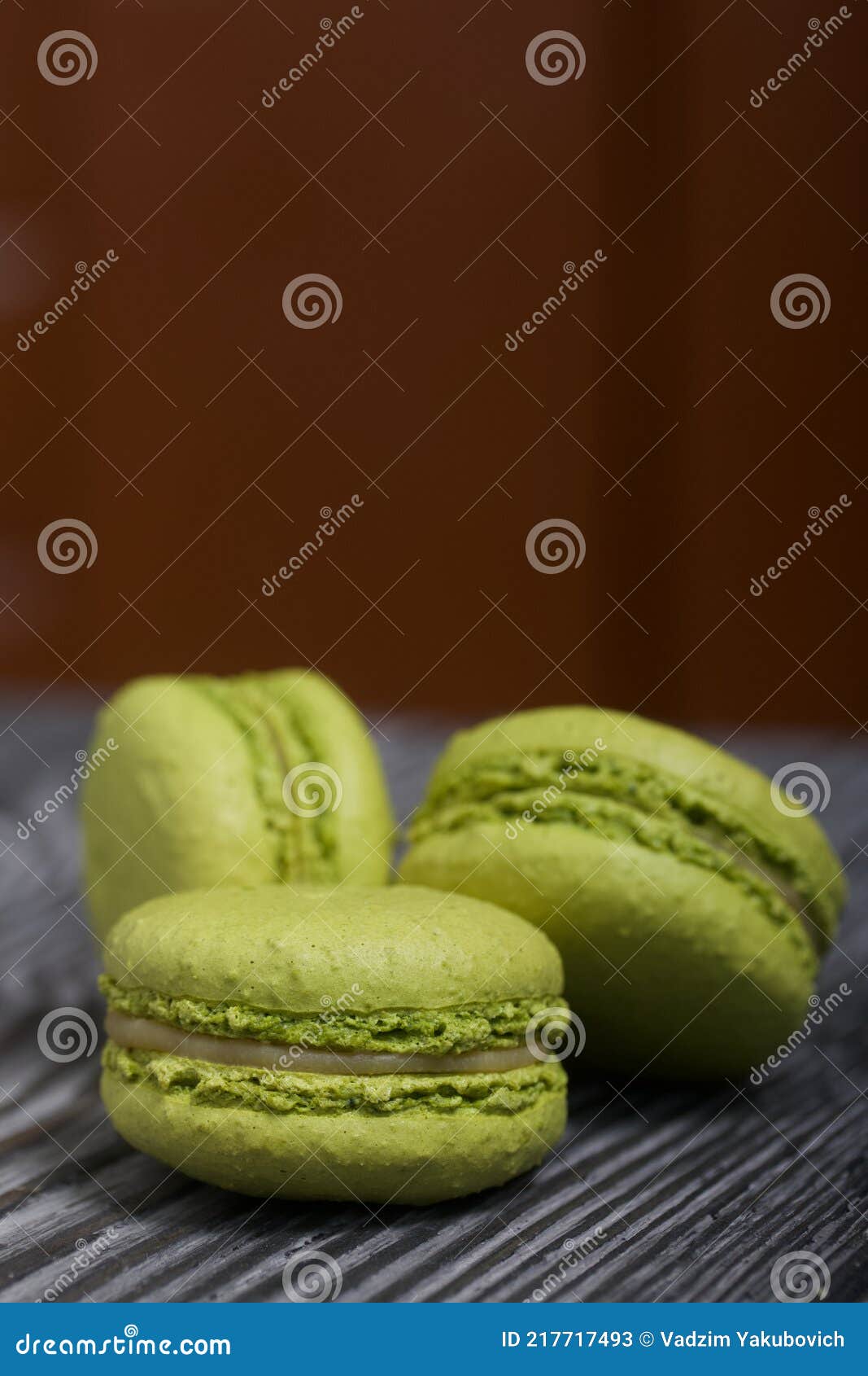 Macarons Cakes Light Green Color. They Lie On Black And White Pine ...