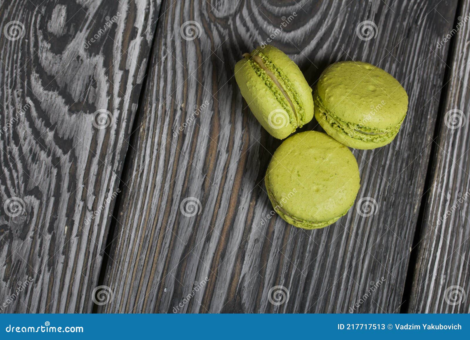 Macarons Cakes Light Green Color. They Lie On Black And White Pine ...