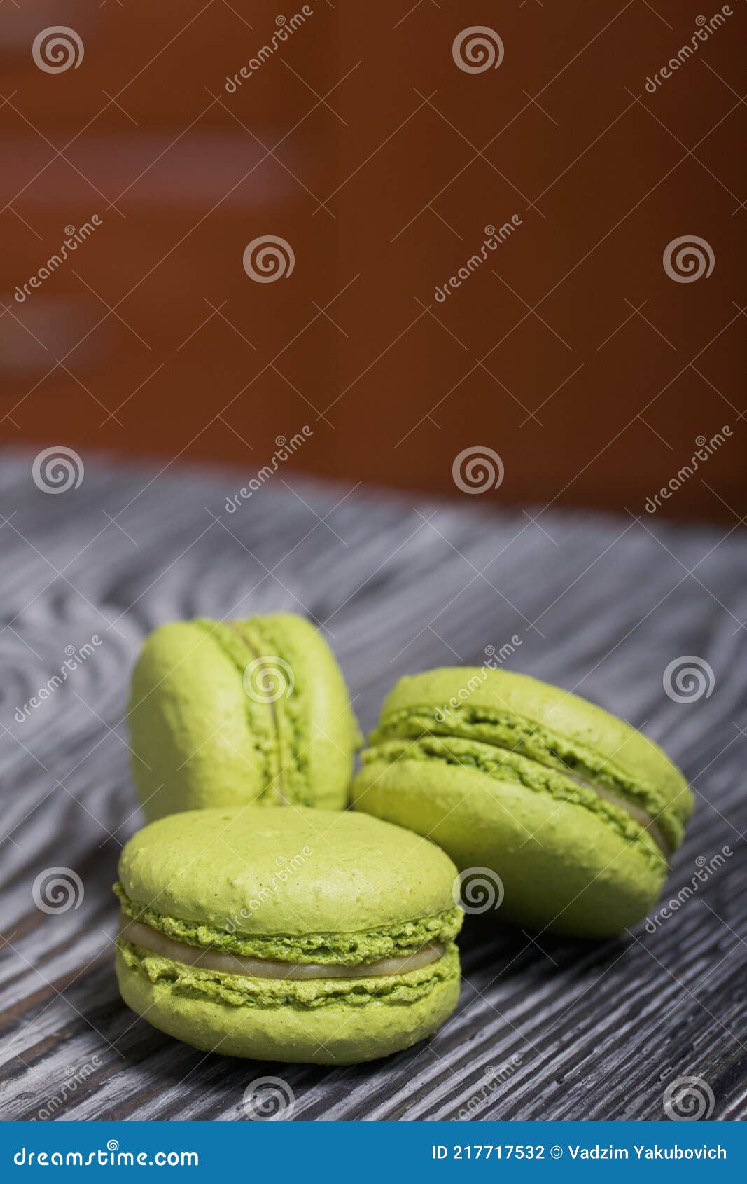 Macarons Cakes Light Green Color. They Lie On Black And White Pine ...