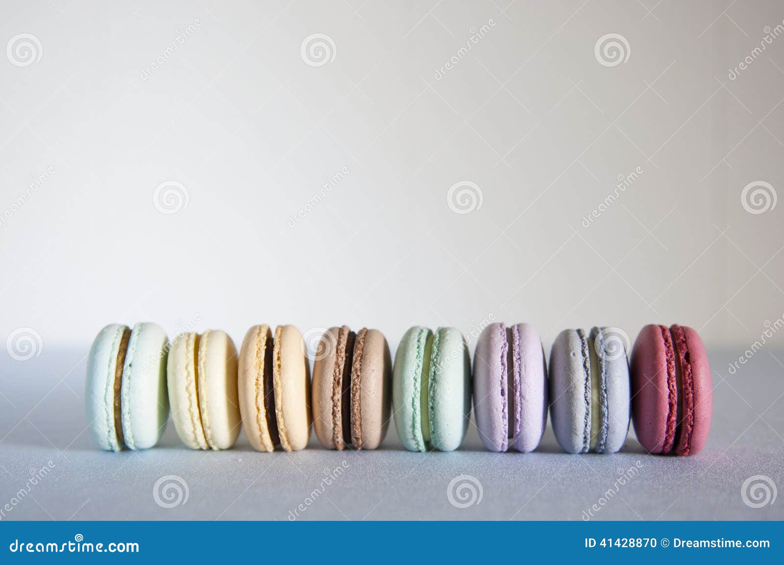 Macarons in a row. stock photo. Image of sweets, chocolate - 41428870