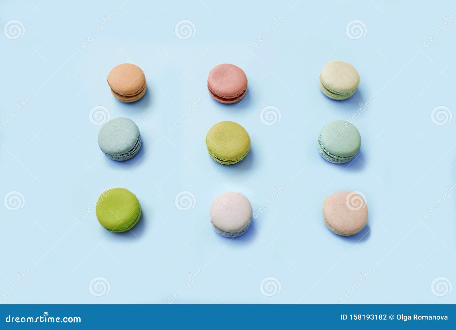 Macaroon or Macaron Biscuits on Light Blue Background. Stock Photo ...