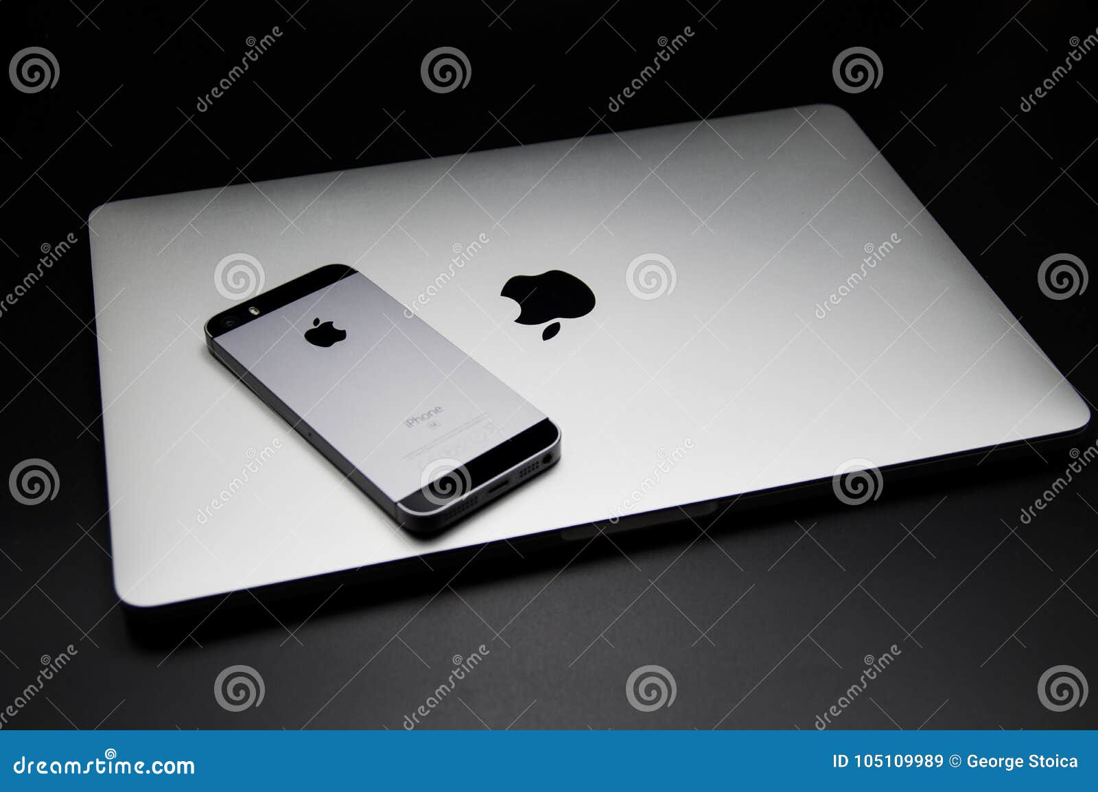 Macbook Pro 2016 Touch Bar and Iphone SE on Top Editorial Stock Image ...