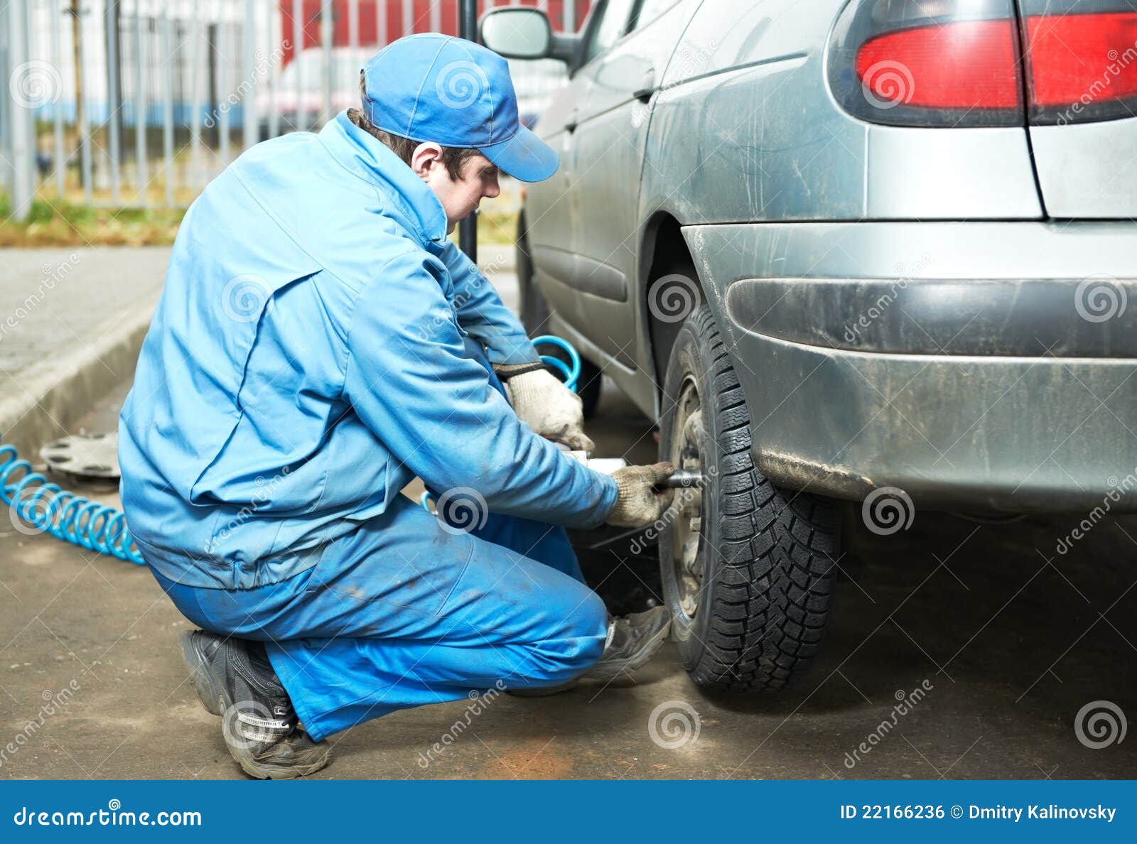 Machanic Repairman at Tyre Fitting Stock Photo - Image of compressed ...
