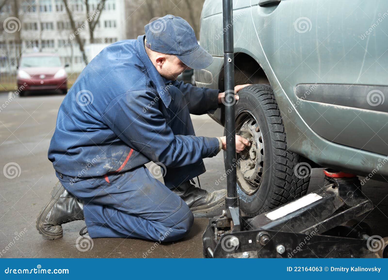 Machanic Repairman at Tyre Fitting with Car Jack Stock Image - Image of ...