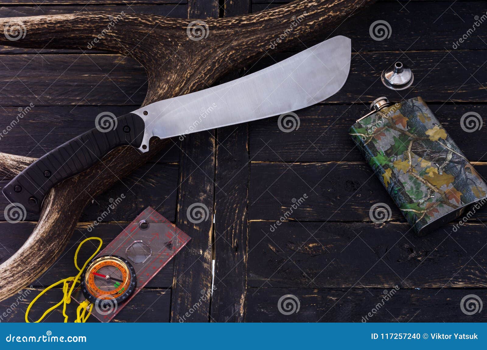 A Machete of a Hunter. Camouflaged Jar. Compass for Orientation Stock ...