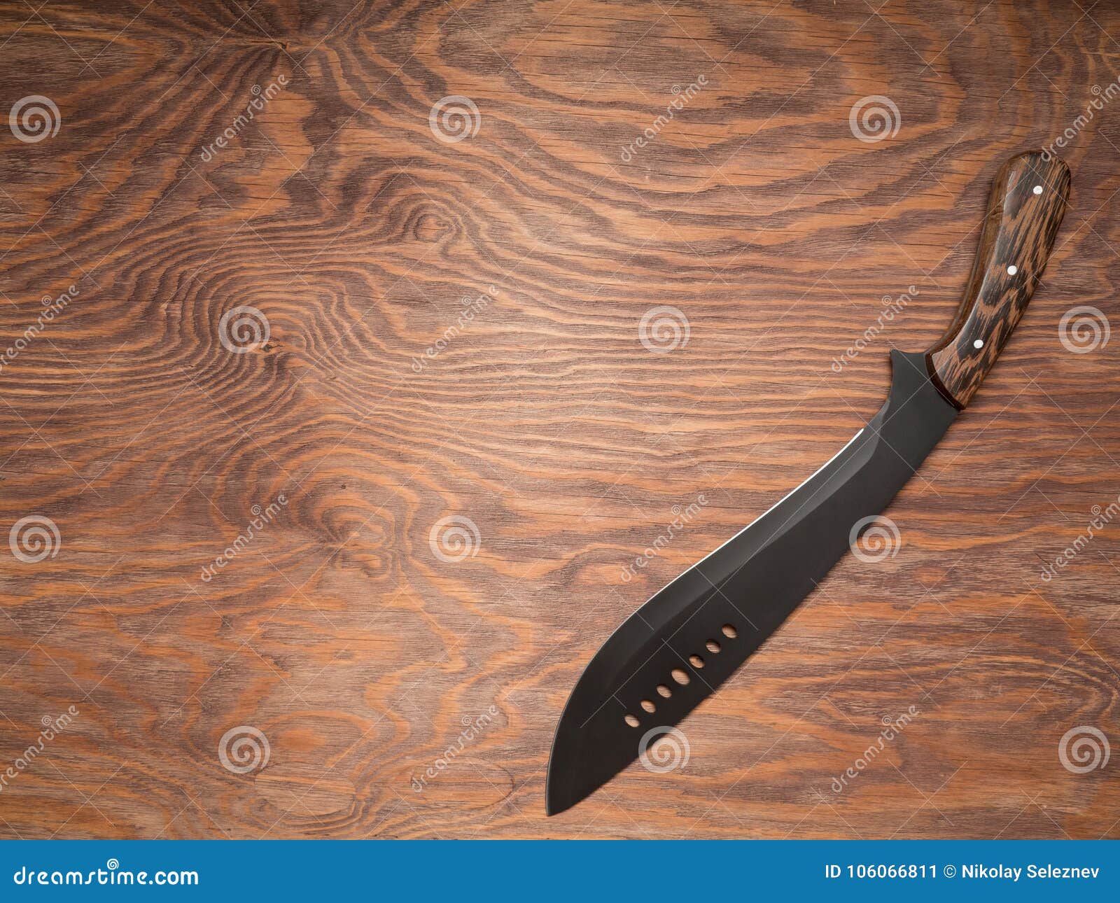 Machete on a wooden table stock image. Image of wooden - 106066811