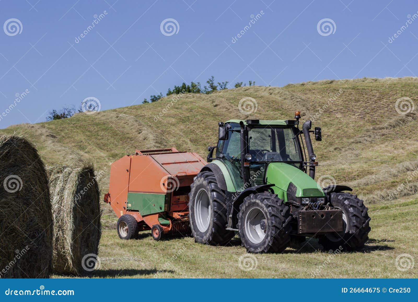 Machine for bales of hay stock image. Image of harvest - 26664675
