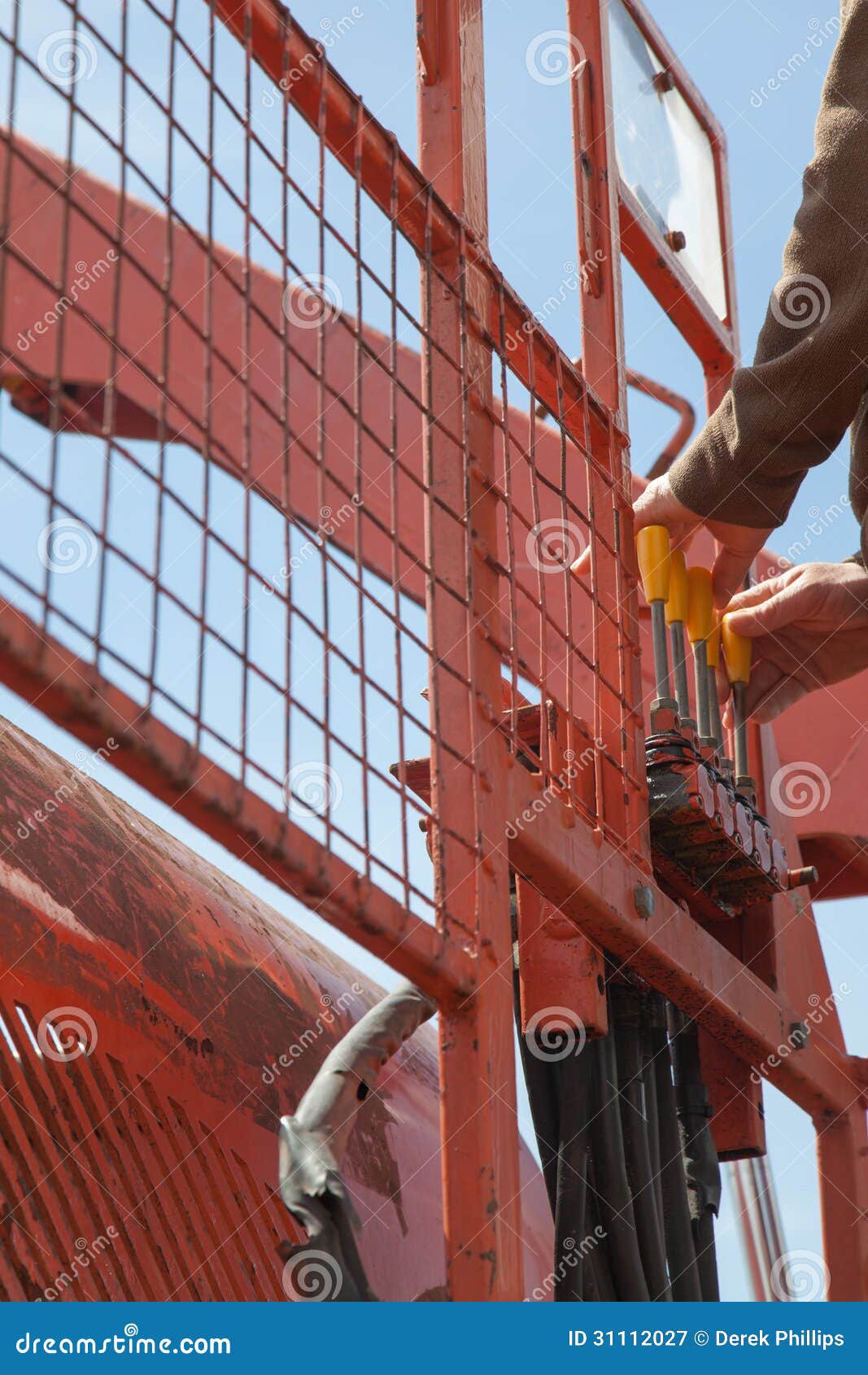 Machine Being Operated with Levers Stock Image - Image of angle, large ...