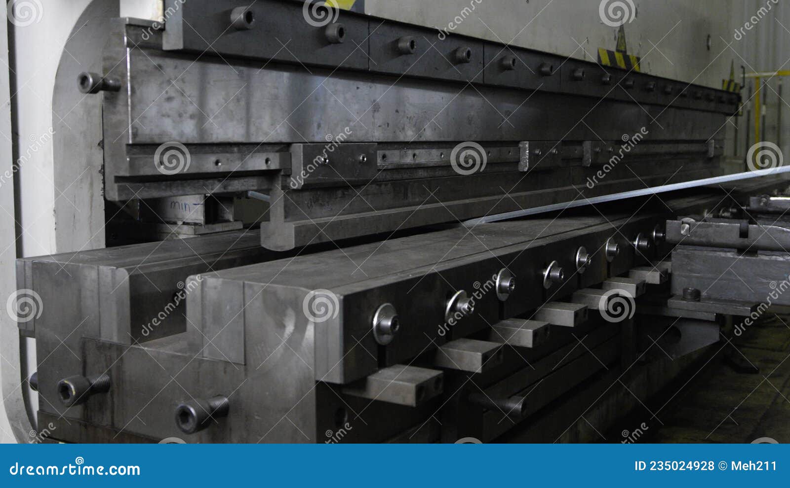 A Machine is Bending a Thick Metal Sheet Stock Footage - Video of ...