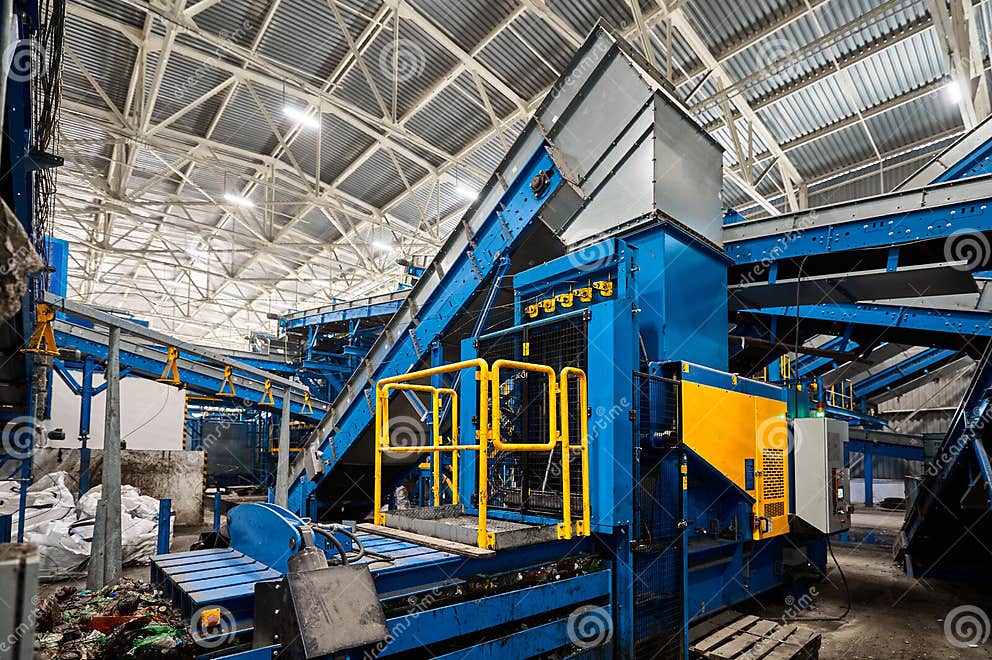 Machine for Compacting Household Waste. Compaction of Garbage into ...