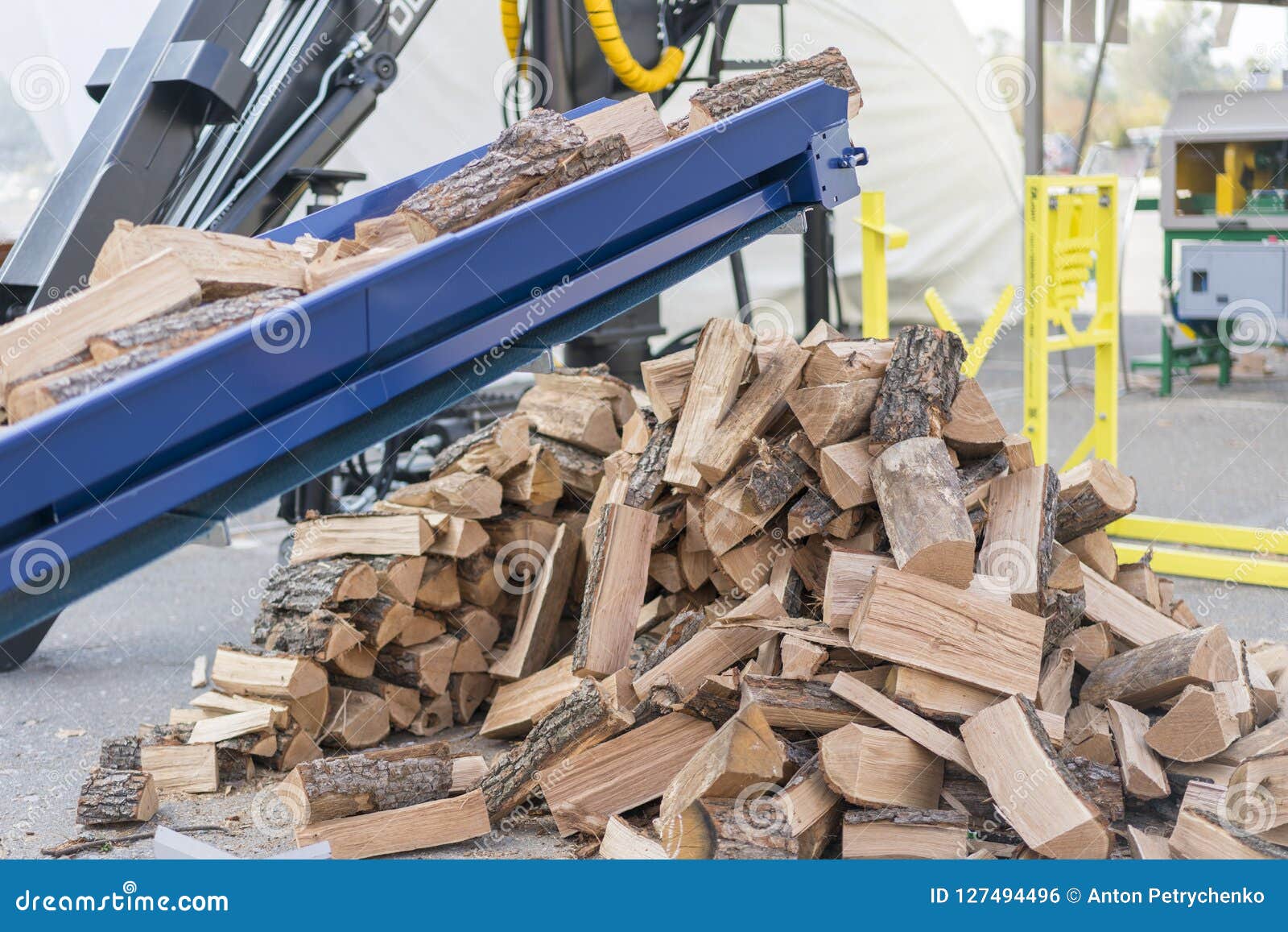 Machine for Cutting Firewood. Chopping Firewood with a Machine Close Up ...