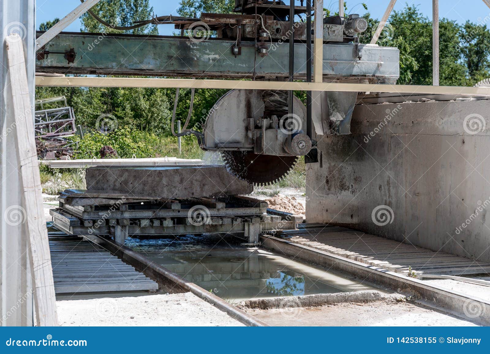 Machine Cutting a Granite Block Stock Image - Image of marble, metal ...