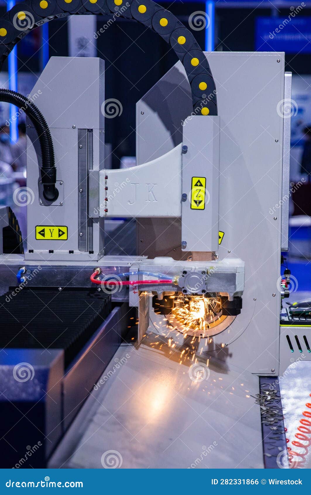 A Machine that is Cutting Metal into Small Pieces of Metal Stock Photo ...