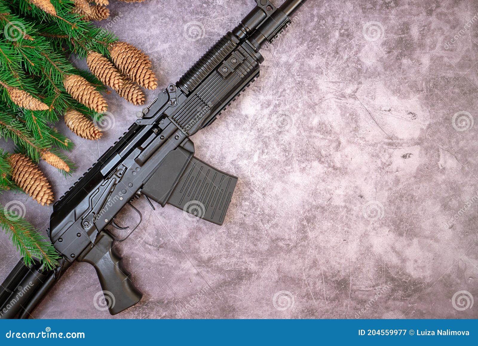 Machine Gun on a Gray Concrete Background. Christmas Concept Stock ...