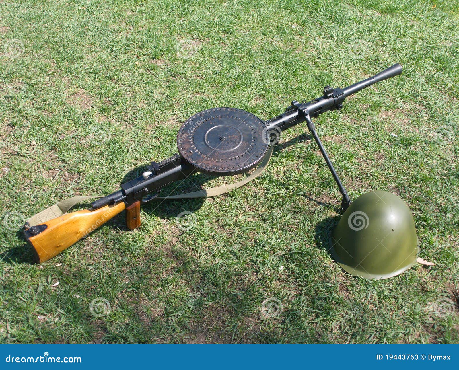 Machine Gun and Military Helmet on Grass Stock Image - Image of weapon ...