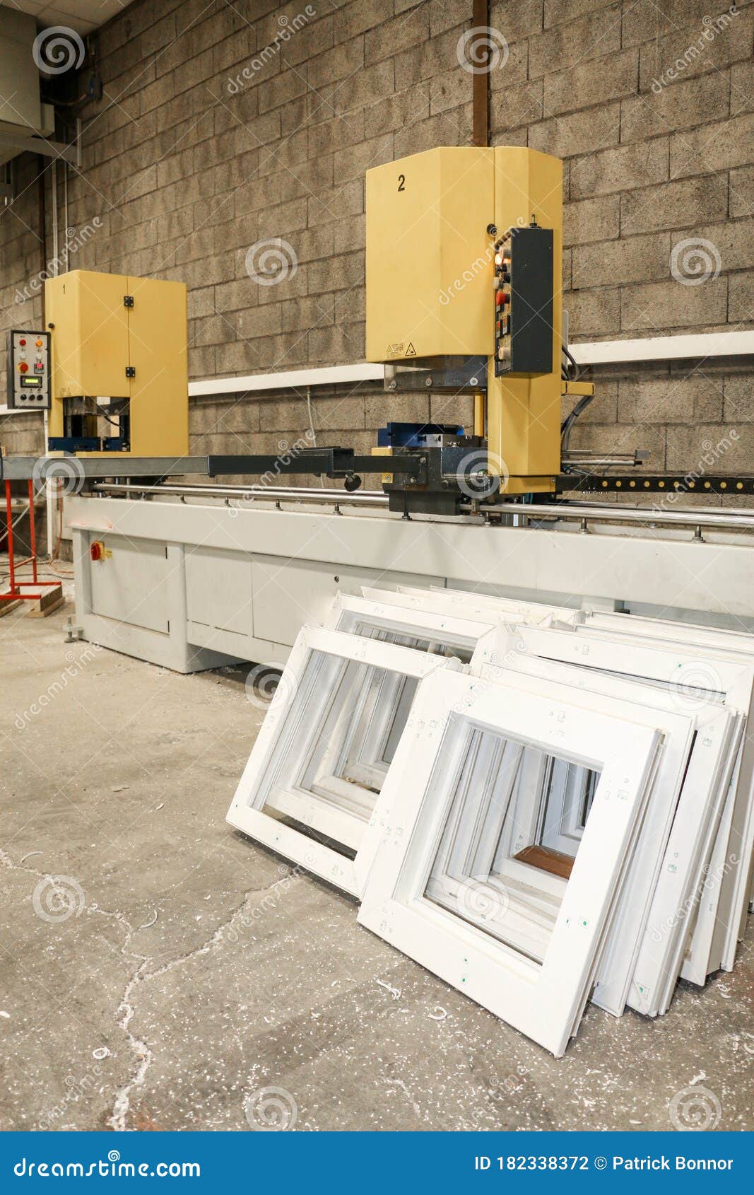 A Machine Mass-produces Pvc Frames for Window Construction Stock Photo ...