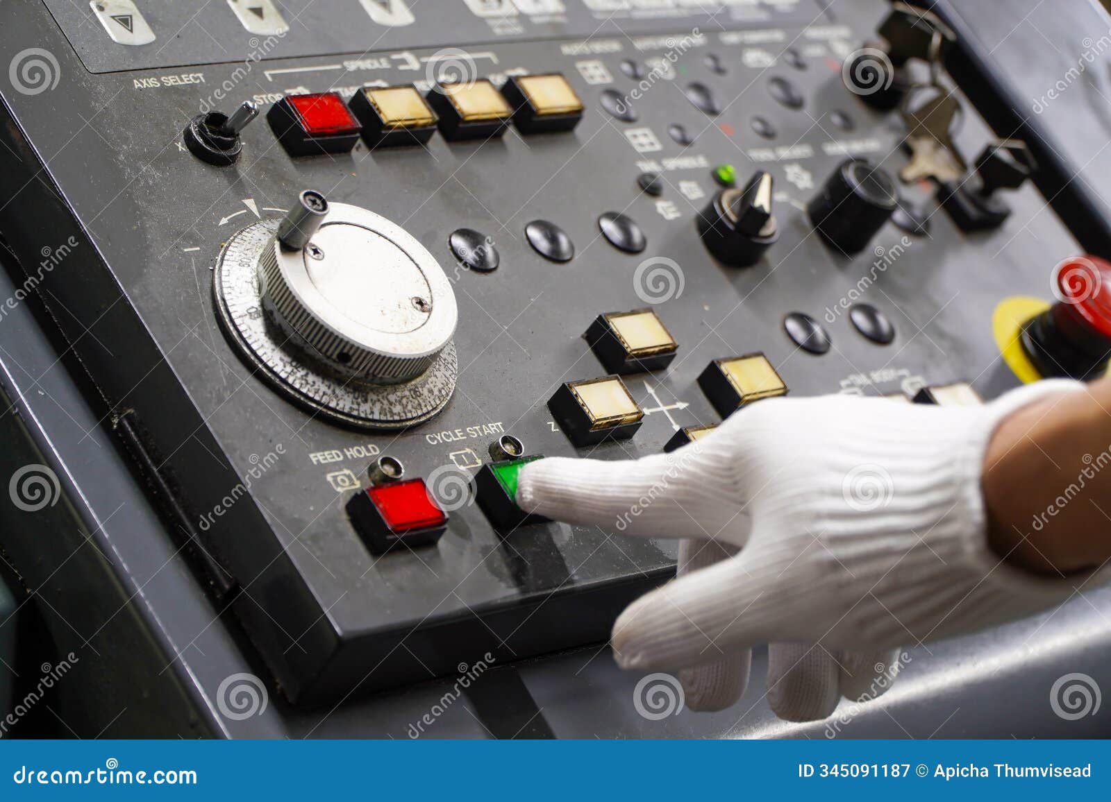 Machine Operator Presses the Green Start Button on the CNC Machine S ...