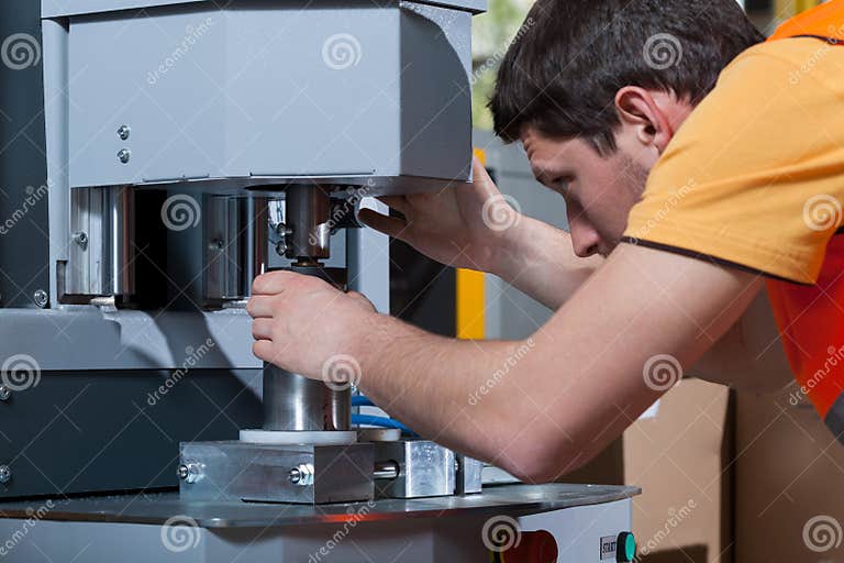 Machine operator at work stock image. Image of manufacturing - 41548721