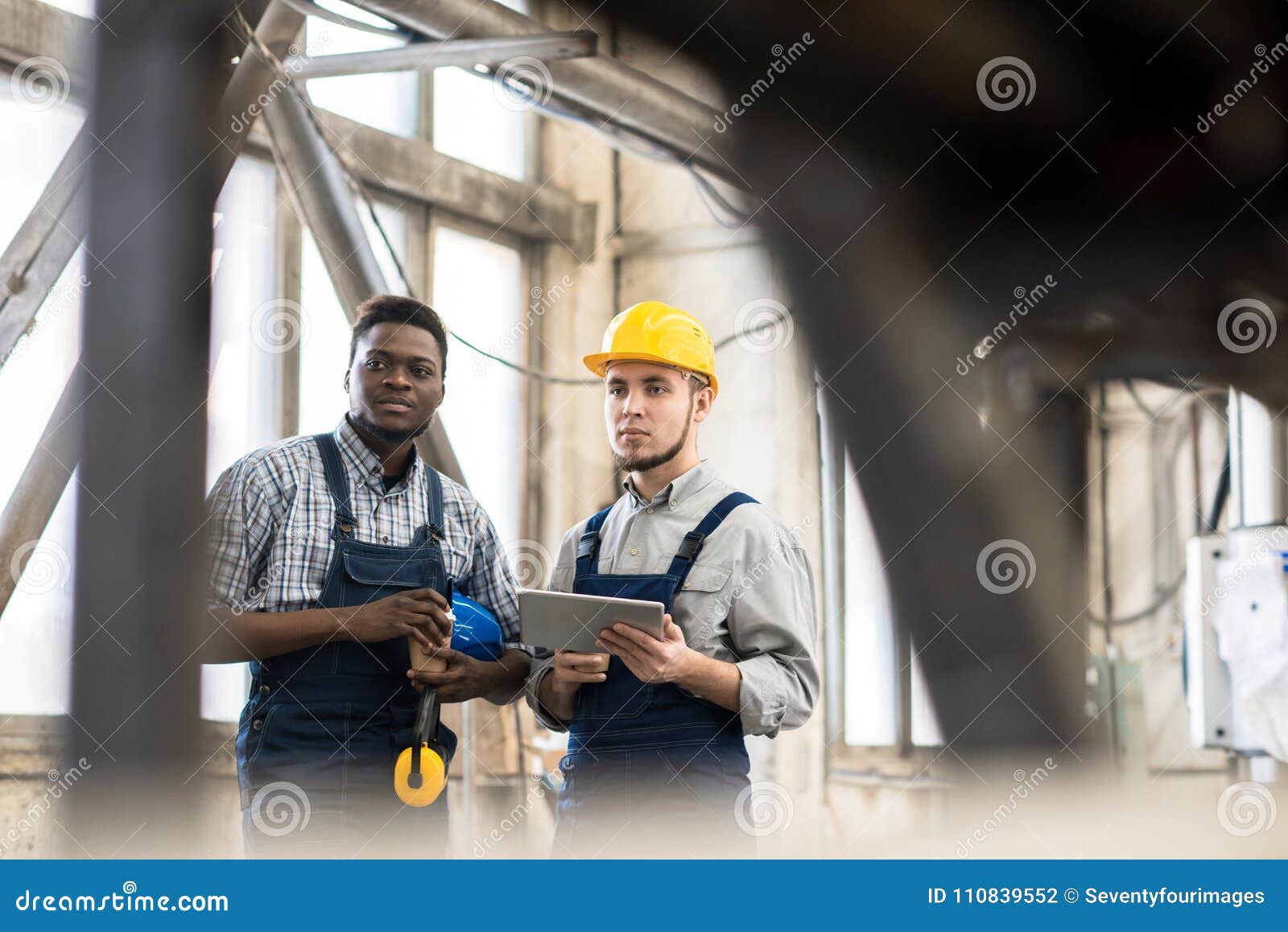 Machine Operators Taking Break from Work Stock Photo - Image of ...