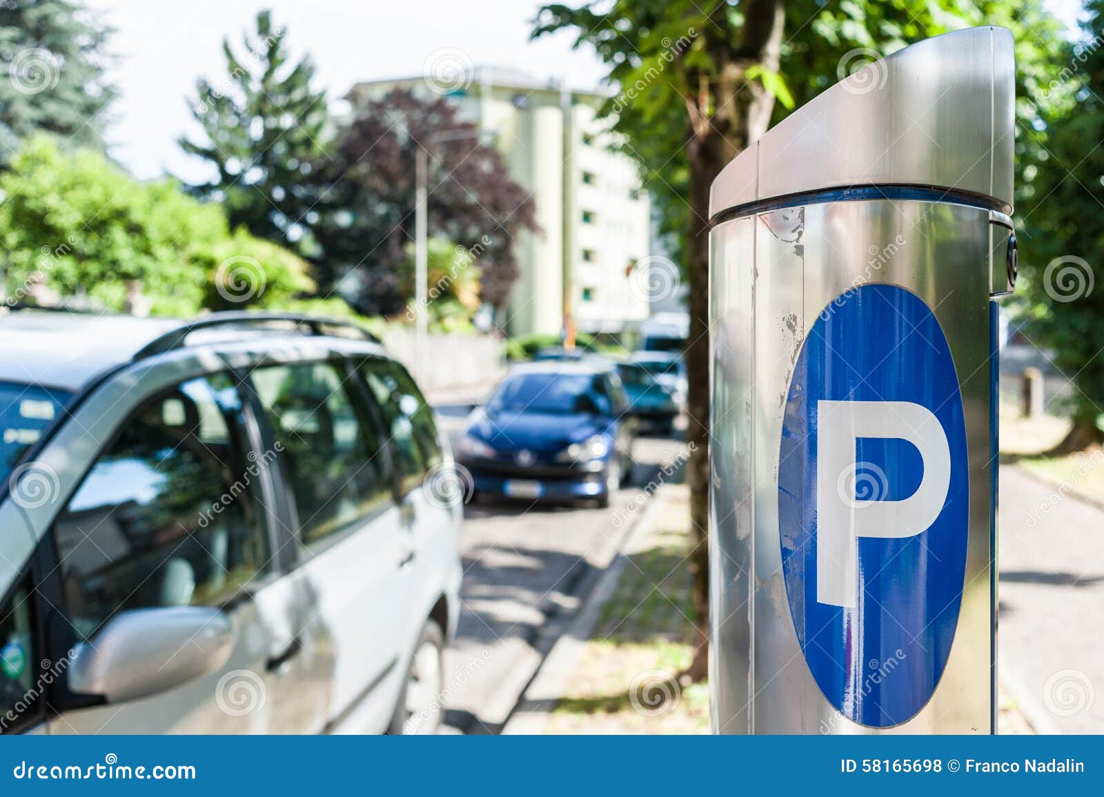 Machine parking stock photo. Image of area, adding, street - 58165698