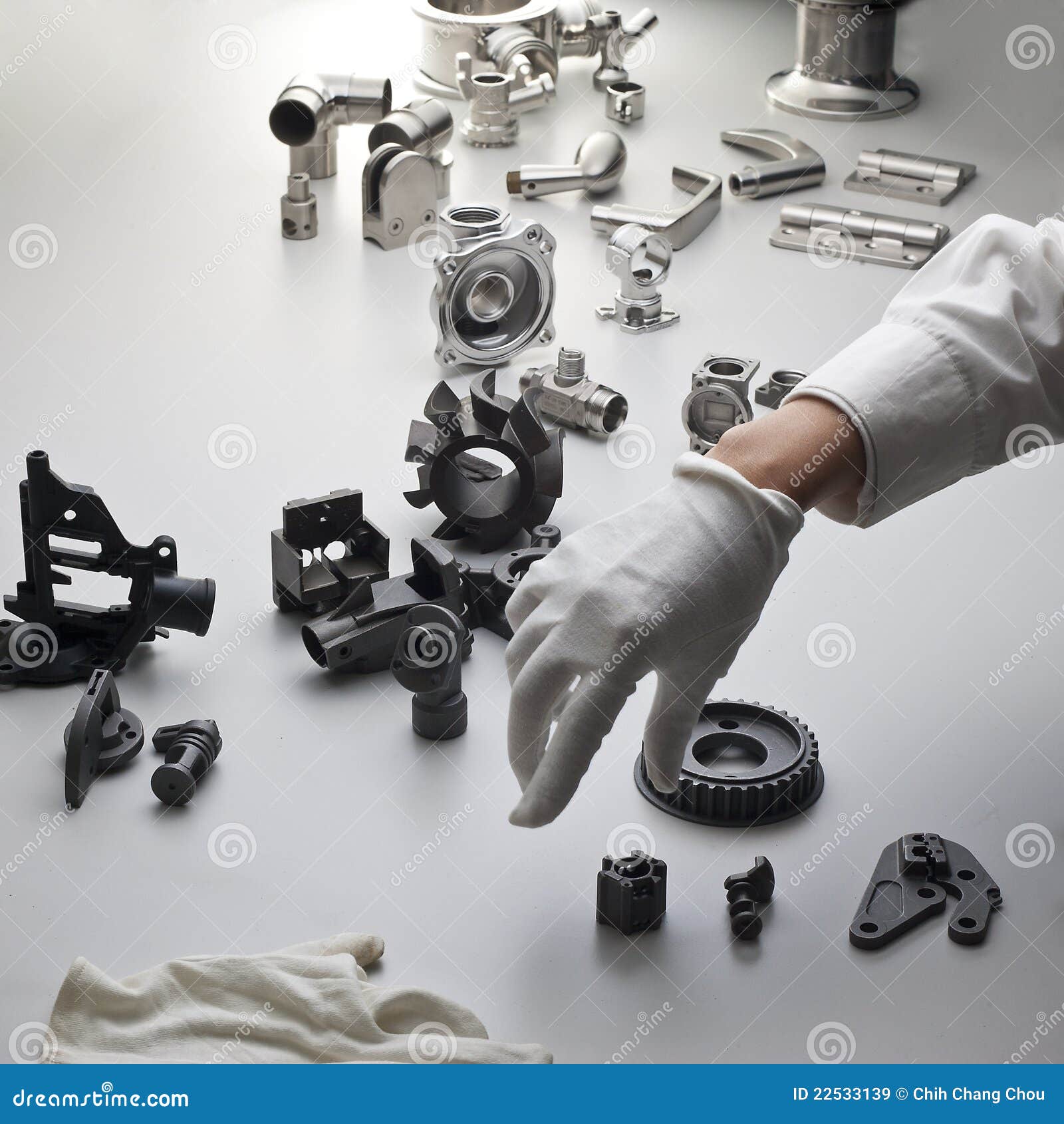 Machine parts and hand stock image. Image of knob, knobs - 22533139